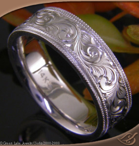 Hand Engraved Leaf And Scroll Pattern With Double Milgrain Edging.
